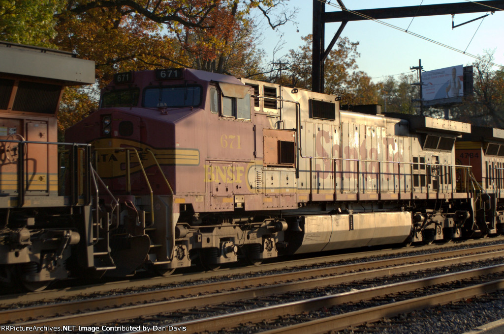 BNSF C44-9W 671 in Warbonnet Paint trails on K042-27